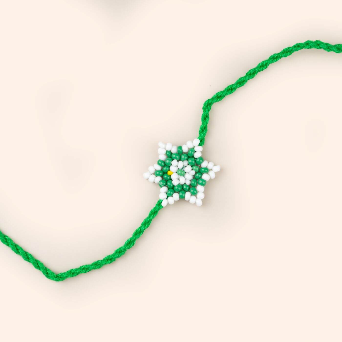 Buy Handcrafted Glass Beads Phool Rakhi With Roli Chawal Online On Zwende