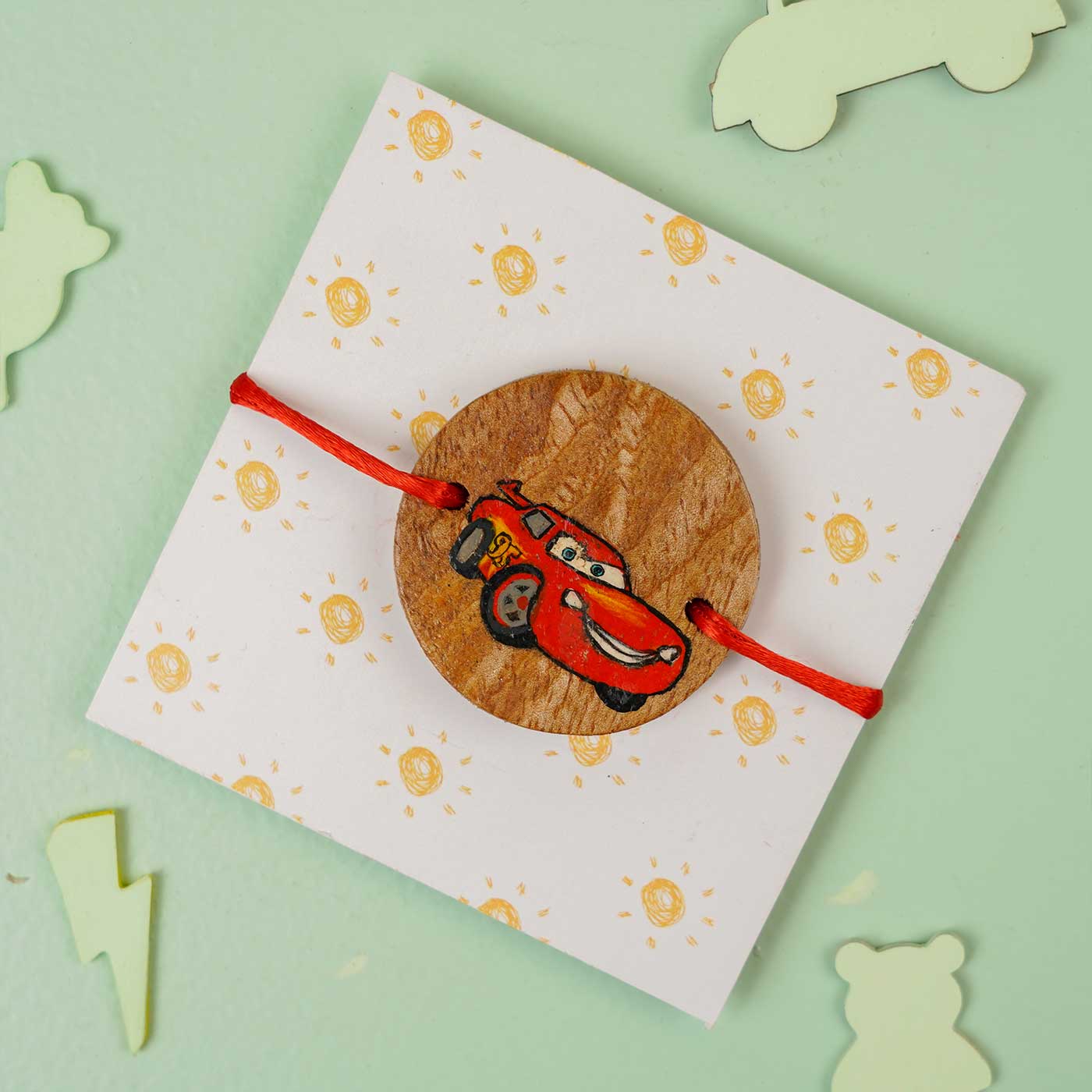 Buy Hand-Painted Cars Theme Wooden Rakhi With Roli Chawal Online On Zwende