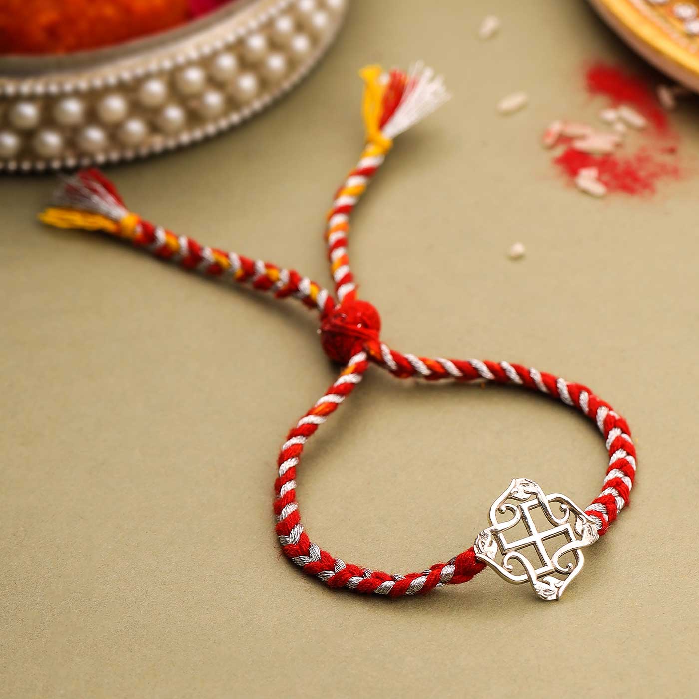 Buy Handmade Swastik Design Silver Rakhi For Brother Online On Zwende