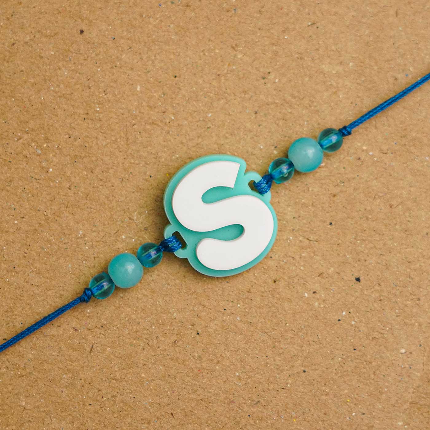 Buy Personalized Handmade 3D Alphabet Acrylic Rakhi With Roli Chawal ...