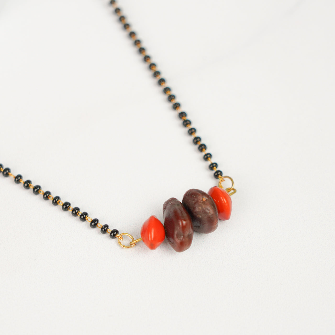Buy Handmade Single Chain Gunj & Tamarind Seed Mangalsutra Online On Zwende