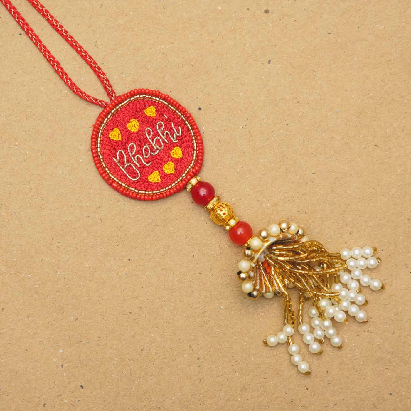 Buy Handmade Beaded Bhabhi Lumba Rakhi With Roli Chawal Online On Zwende