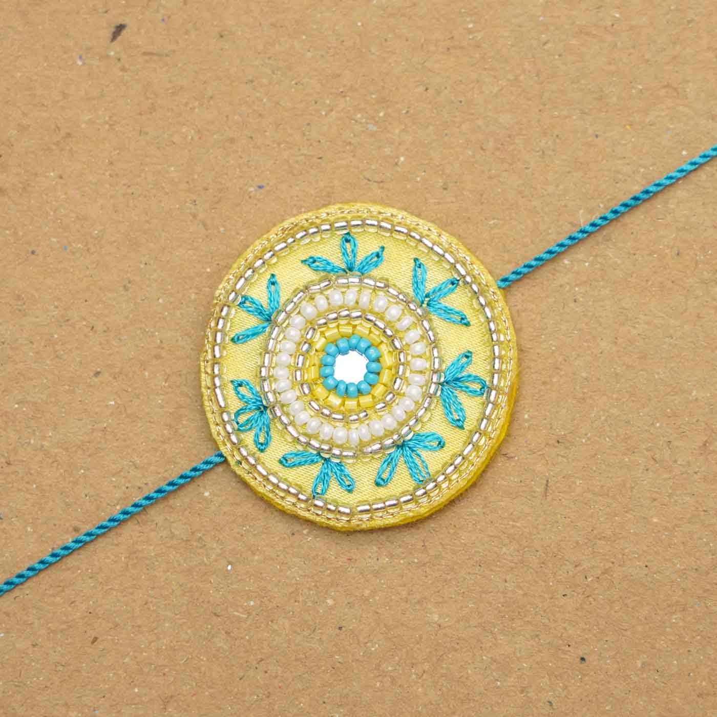 Buy Handmade Beaded Round Rakhi With Roli Chawal Online On Zwende