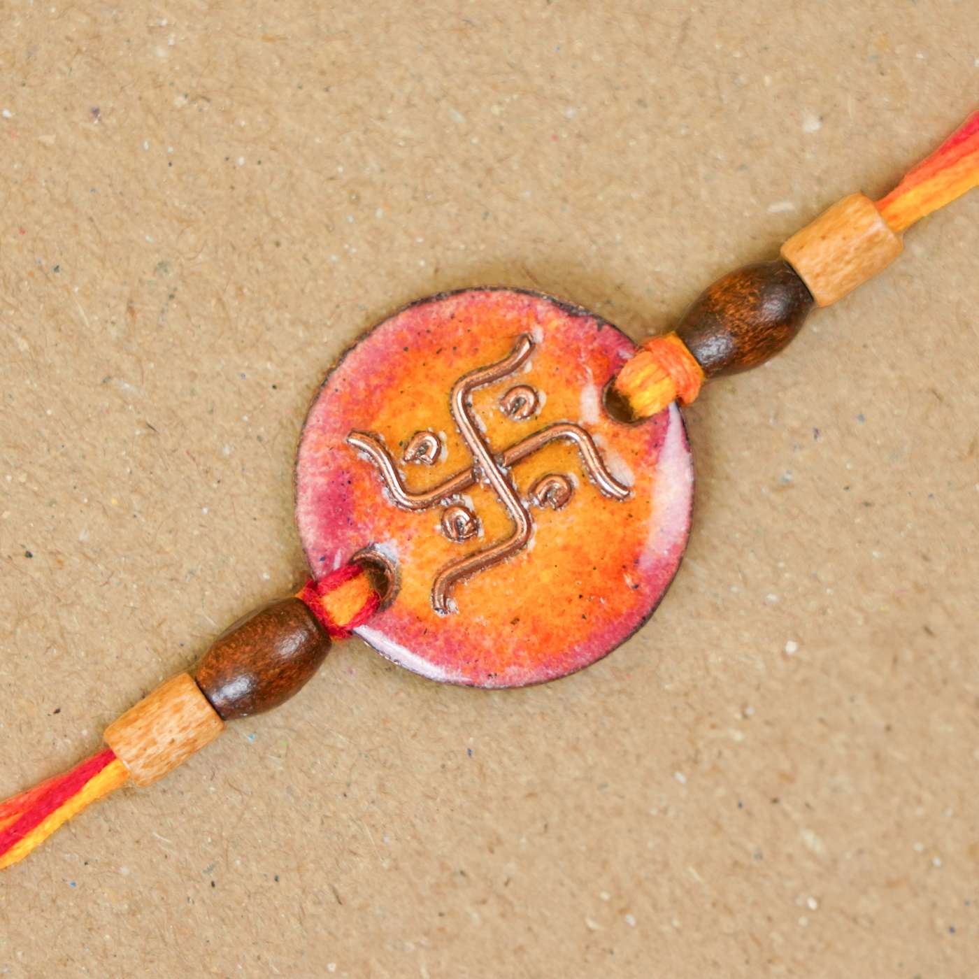 Buy Handmade Swastika Copper Enamel Rakhi With Chocolates & Roli Chawal ...