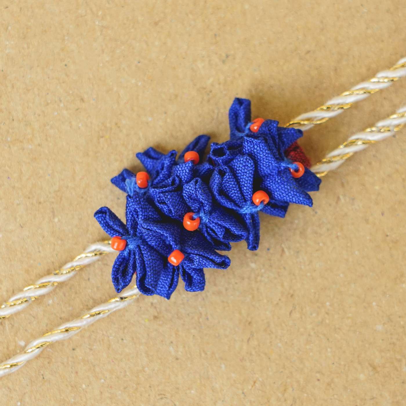 Buy Handmade Blue Cluster Flowers Upcycled Fabric Rakhi With Roli ...