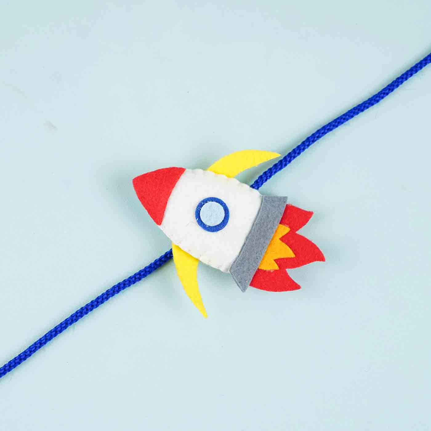 Buy Handmade Felt Rocket Kids Rakhi With Roli Chawal Online On Zwende