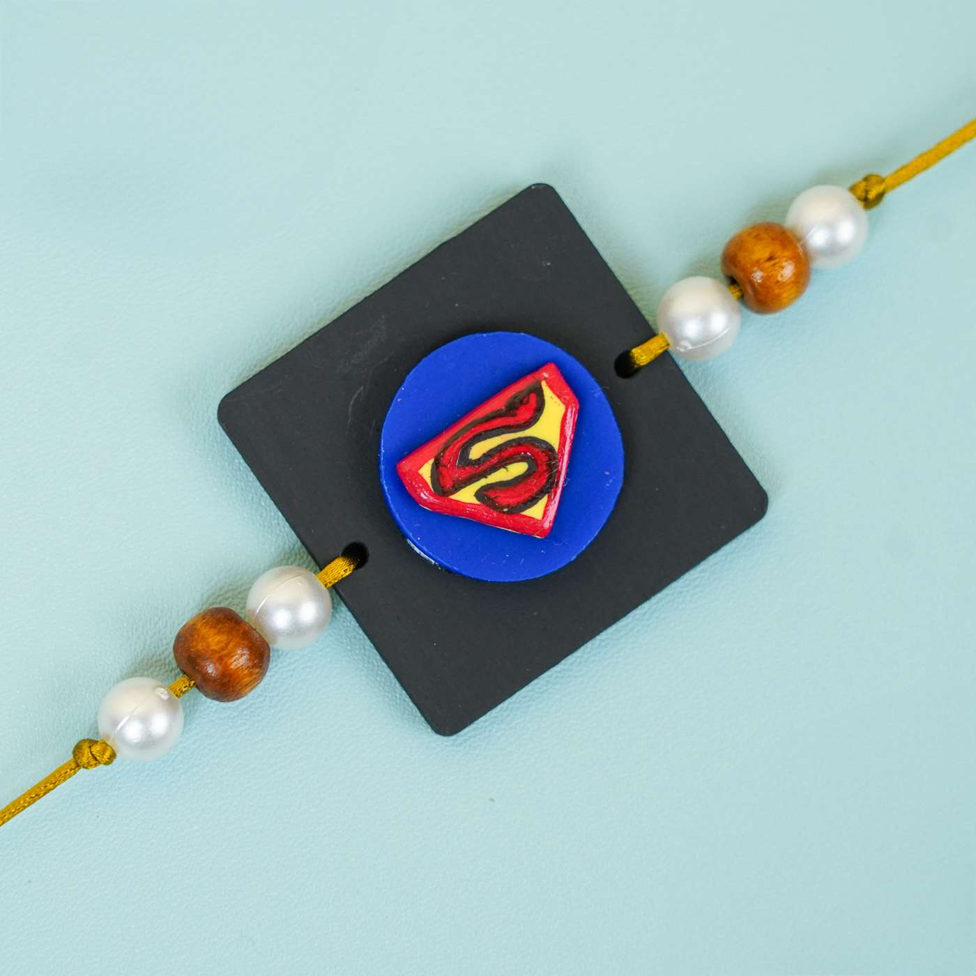 Buy Handmade Miniature Clay Superman Kids Rakhi With Roli Chawal Online ...