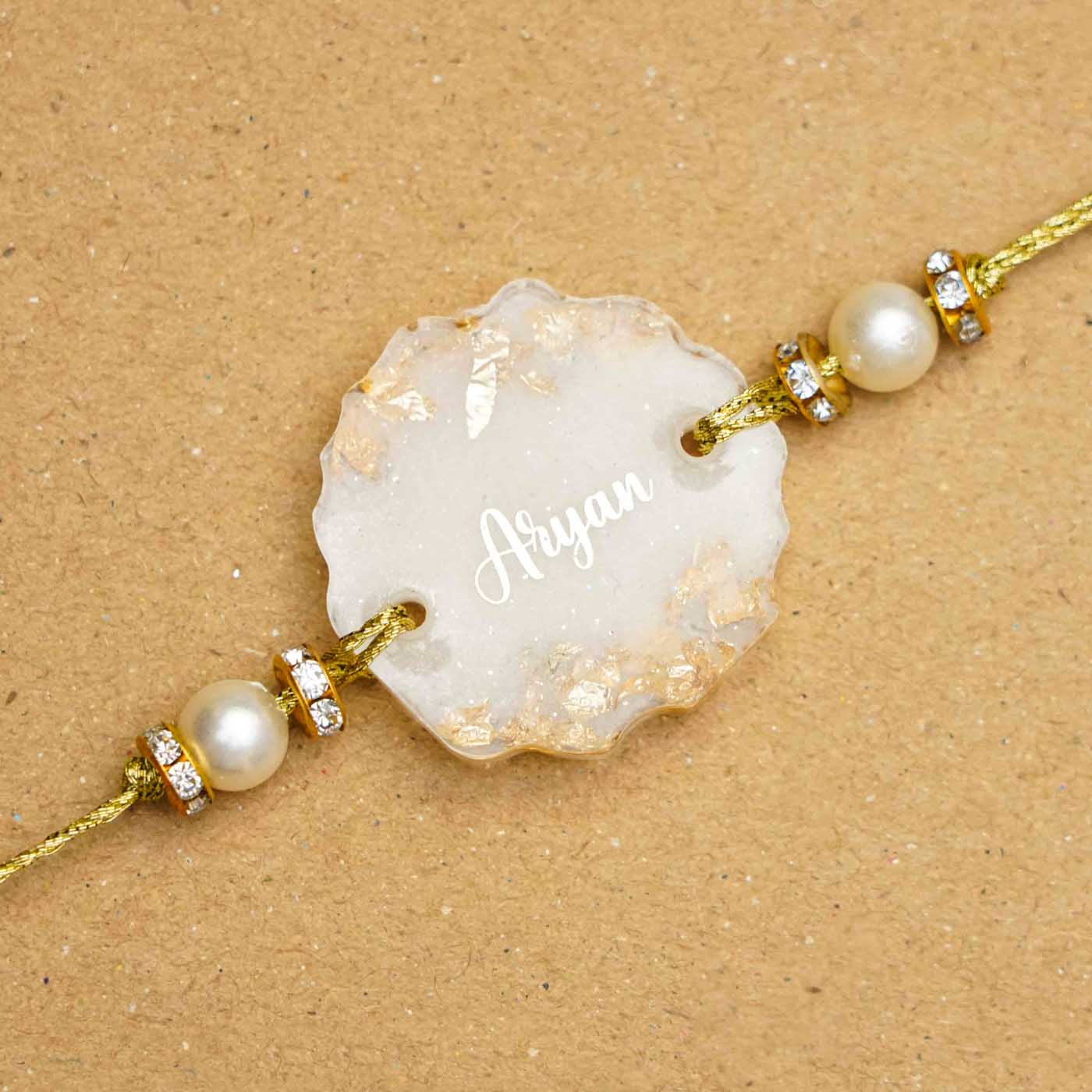 Buy Personalized Handmade Resin Golden Foil Rakhi With Roli Chawal ...