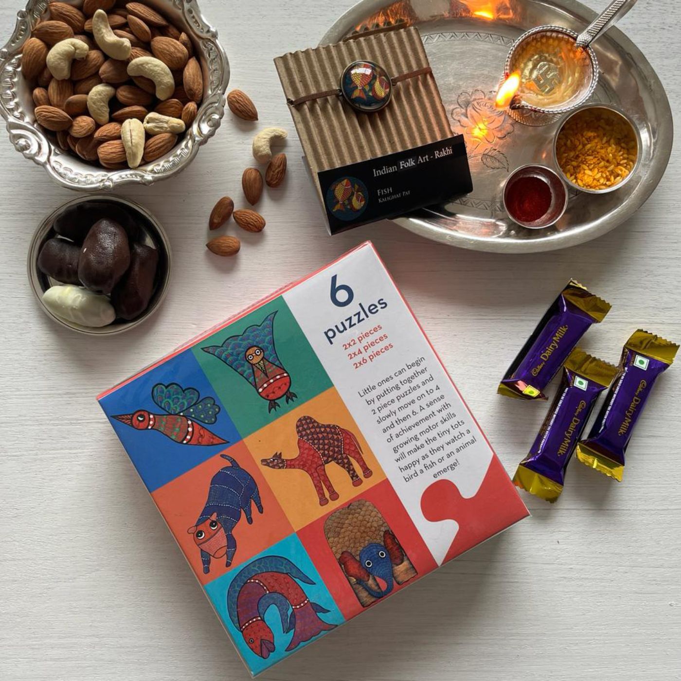 Buy Handcrafted Folk Art Rakhi Hamper For Toddlers With Rice, Roli ...