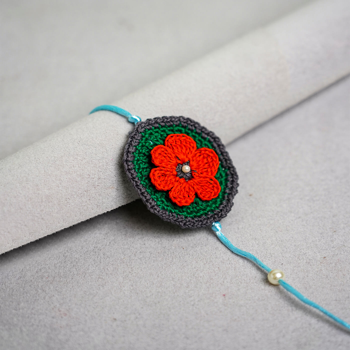 Buy Floral Handcrafted Crochet Rakhi With Roli Chawal Online On Zwende