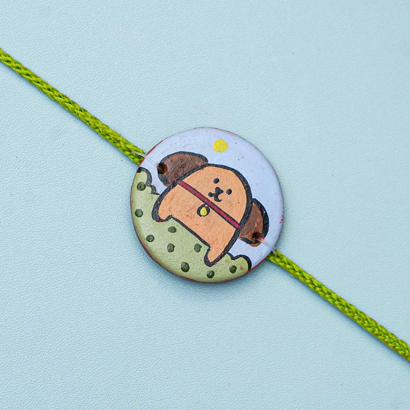 Buy Hand-painted Dog Terracotta Rakhi With Roli Chawal for Kids Online ...