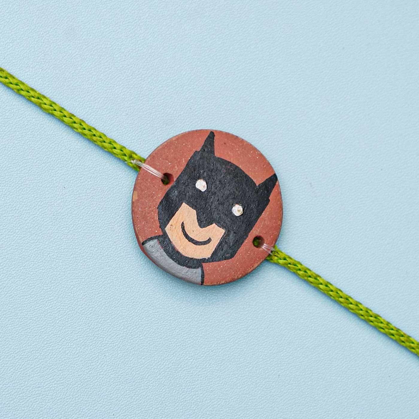 Buy Hand-painted Batman Terracotta Rakhi With Roli Chawal for Kids ...
