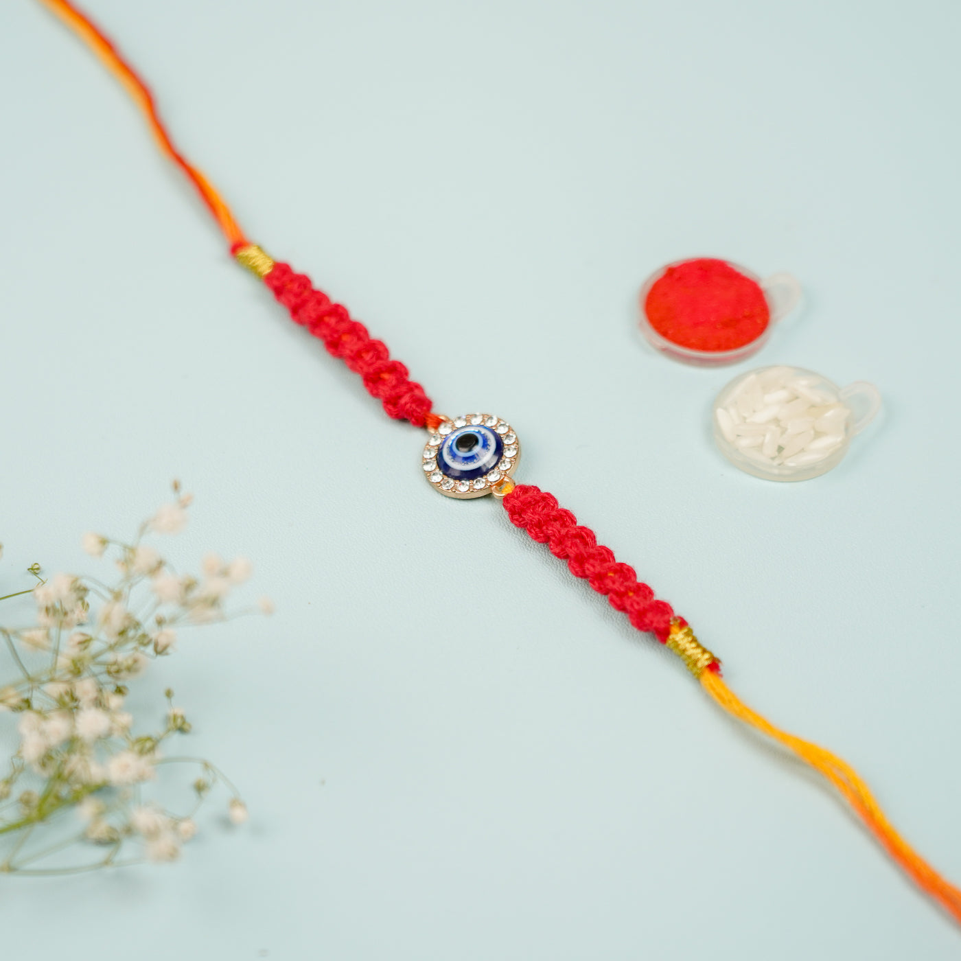 Buy Handmade Macrame Circle Evil Eye Metal Rakhi With Roli Chawal ...