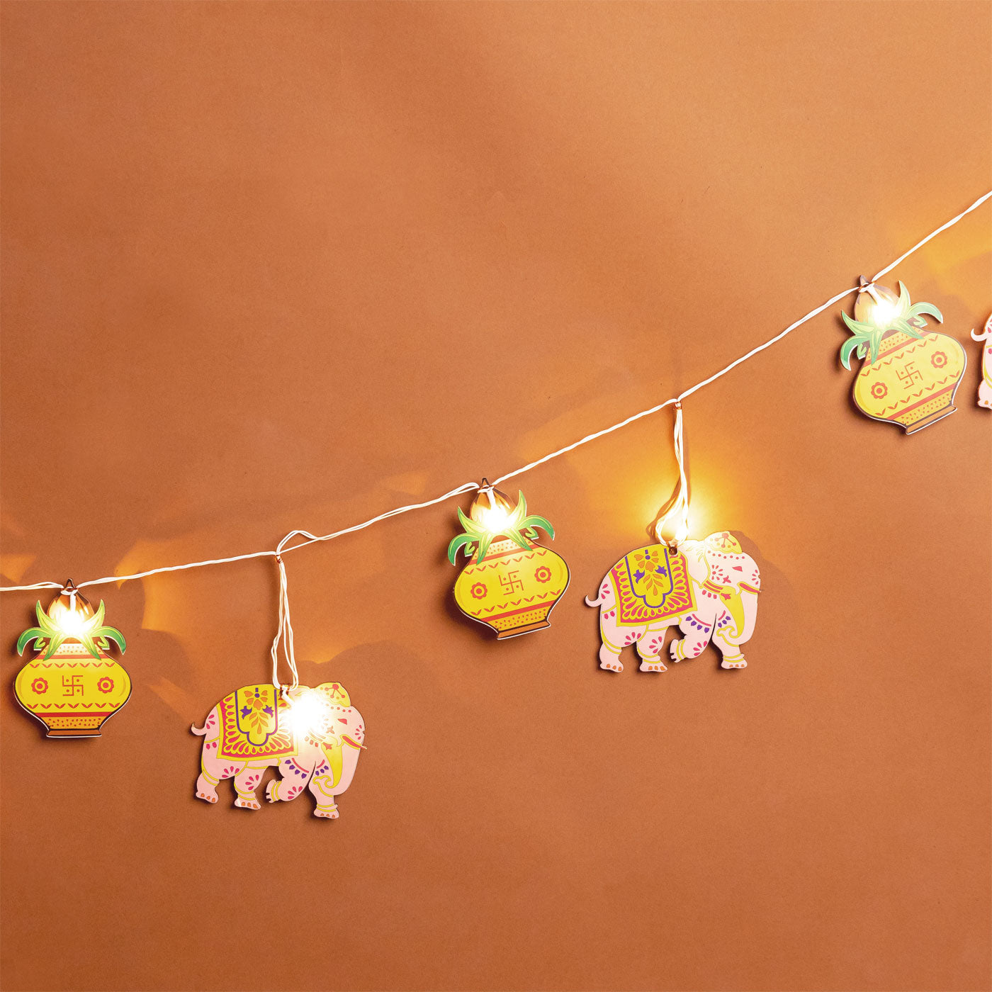 Buy Festive Printed Birch Wood Toran with Lights Online On Zwende