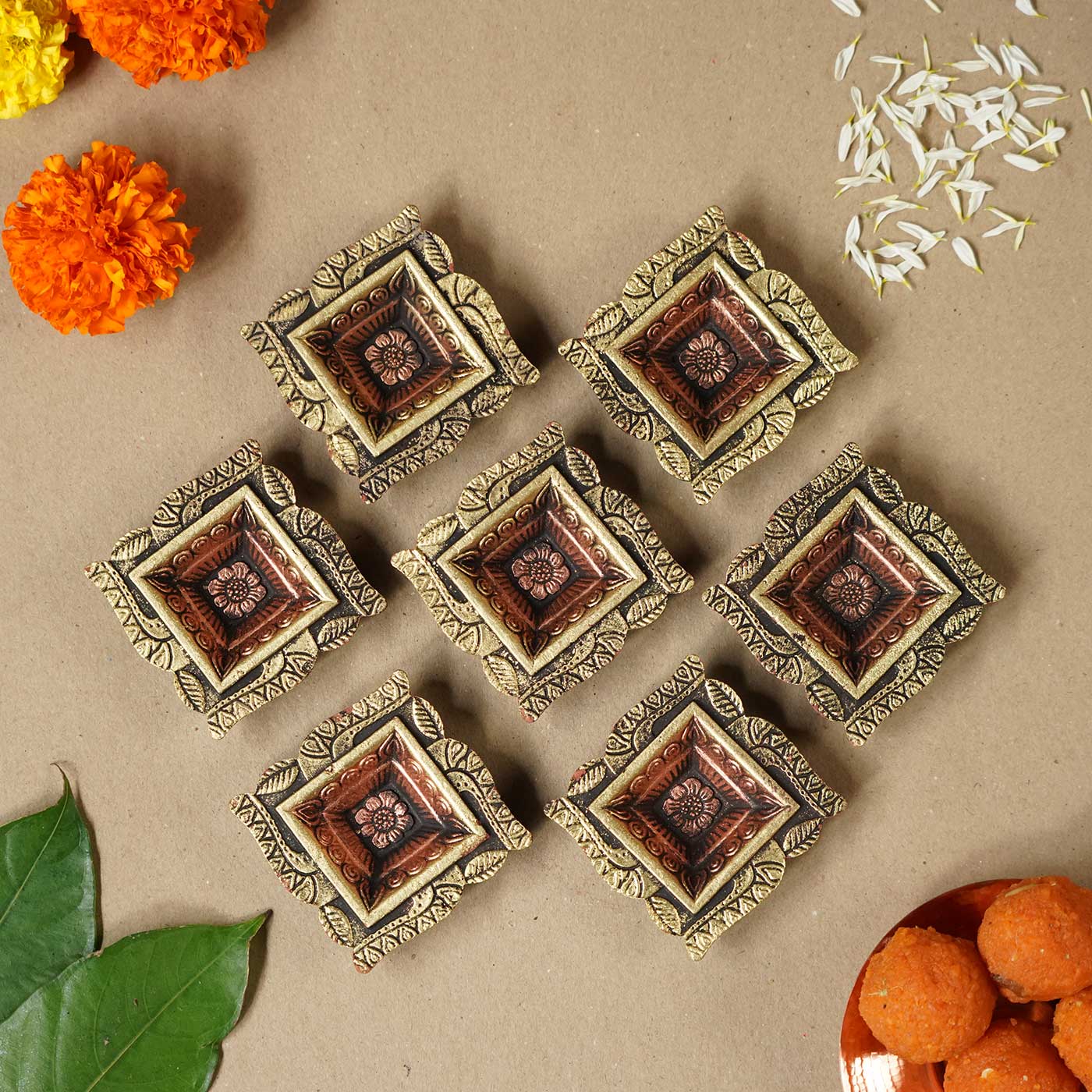 Buy Handmade Swastik Terracotta Oil Lamp / Diya | Set Of 7 Online On Zwende