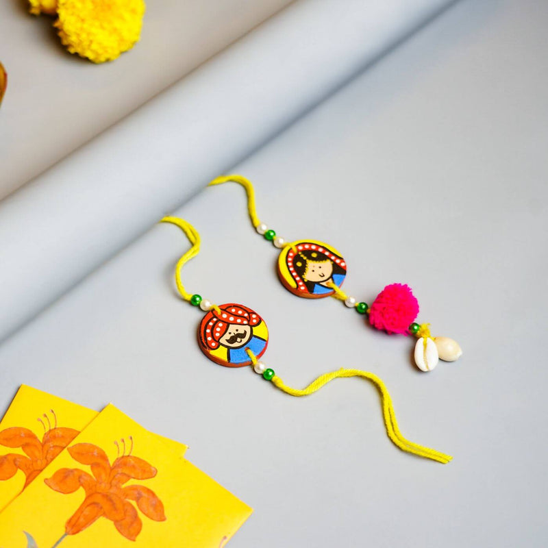 Handcrafted Raja-Rani Terracotta Rakhi With Roli Chawal – Zwende